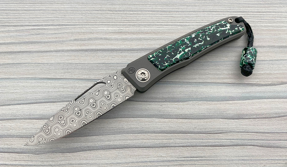 Rinkhals Damasteel Rose in Green Kudu Bone: African Sporting Creations