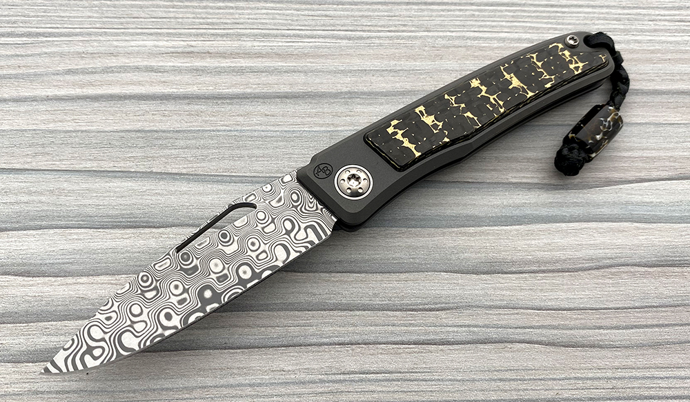 Rinkhals Damasteel Rose in Snakeskin Carbon Fiber: African Sporting ...